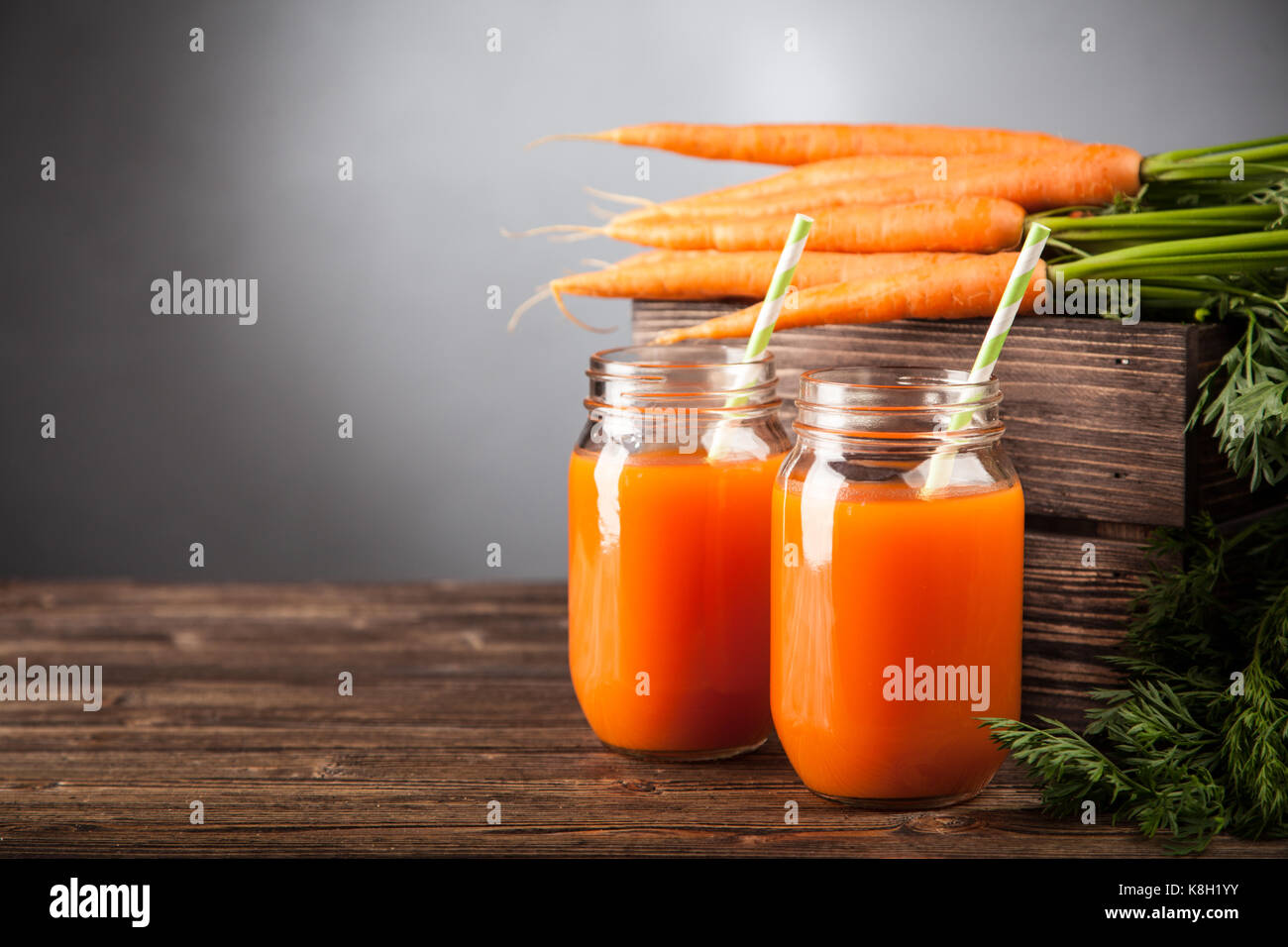 Fresh carrot juice in a bottle Stock Photo - Alamy