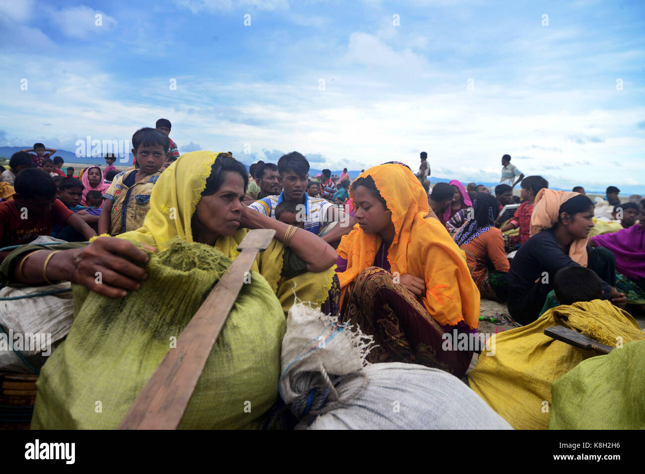 Rohingya refugees cross into the mainland after arriving in Bangladesh ...