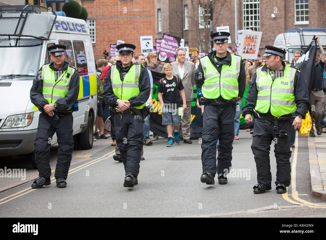 Police officers leading a rally Stock Photo - Alamy