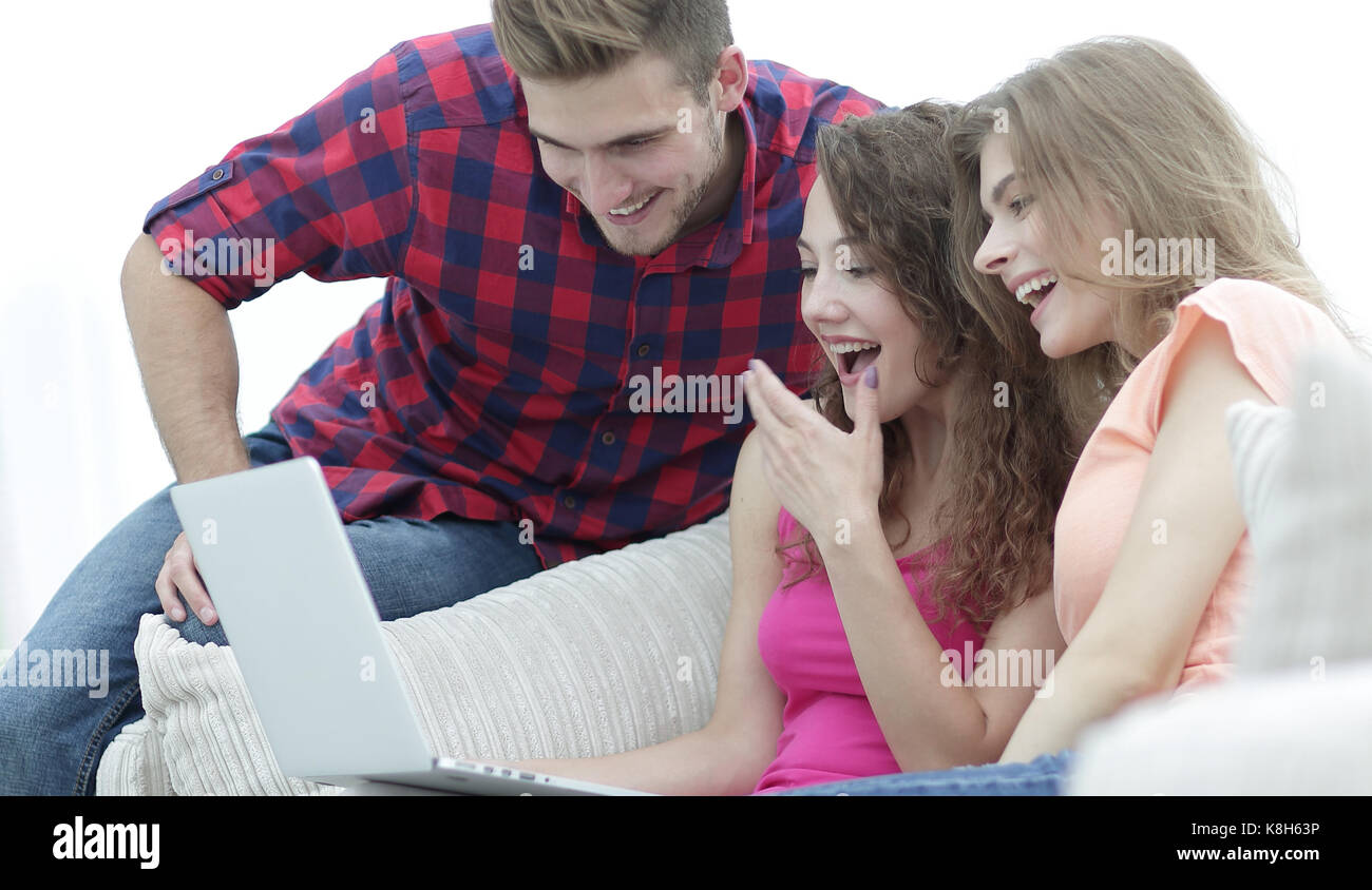 group of young people watching videos on the laptop Stock Photo - Alamy