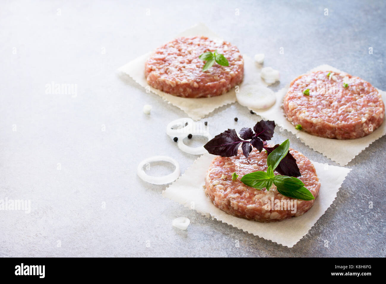 Raw hamburgers cutlets from hi-res stock photography and images - Alamy