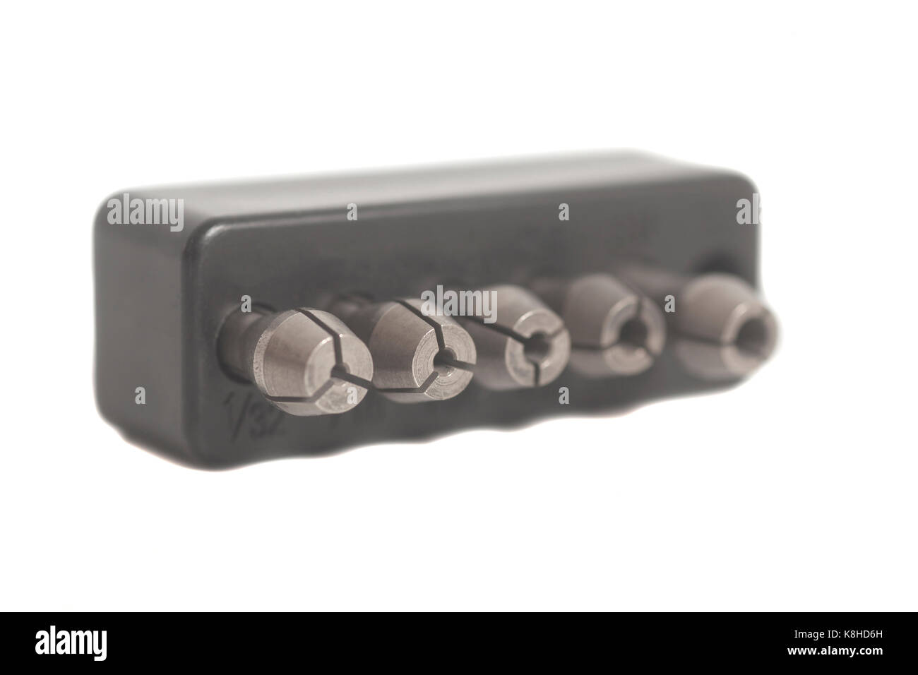 Tool holder collets of different size in a box on white background ...