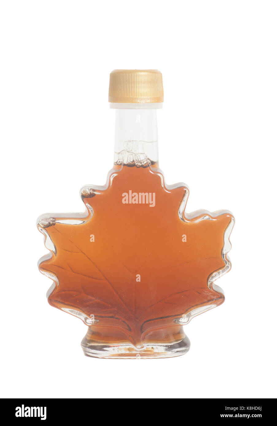 Canadian maple delicious syrup in a bottle isolated on white background ...