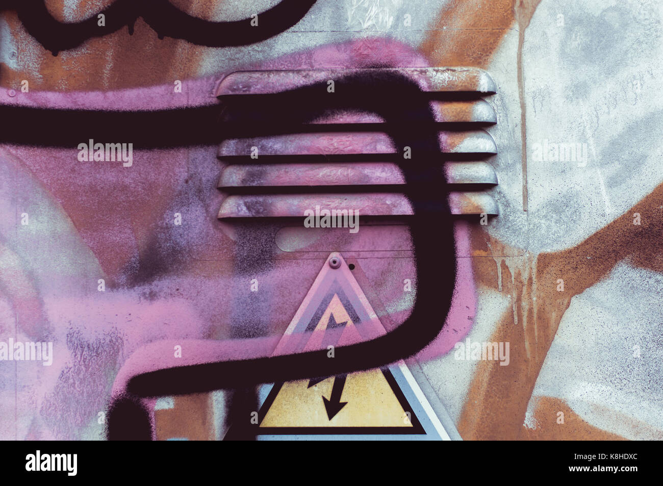 A graffiti painted on an electrical hazard signs Stock Photo - Alamy