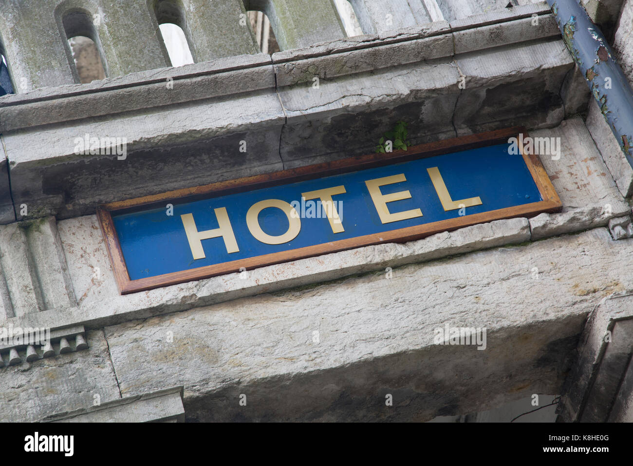 Blue Hotel Sign on Diagonal Slant Stock Photo - Alamy