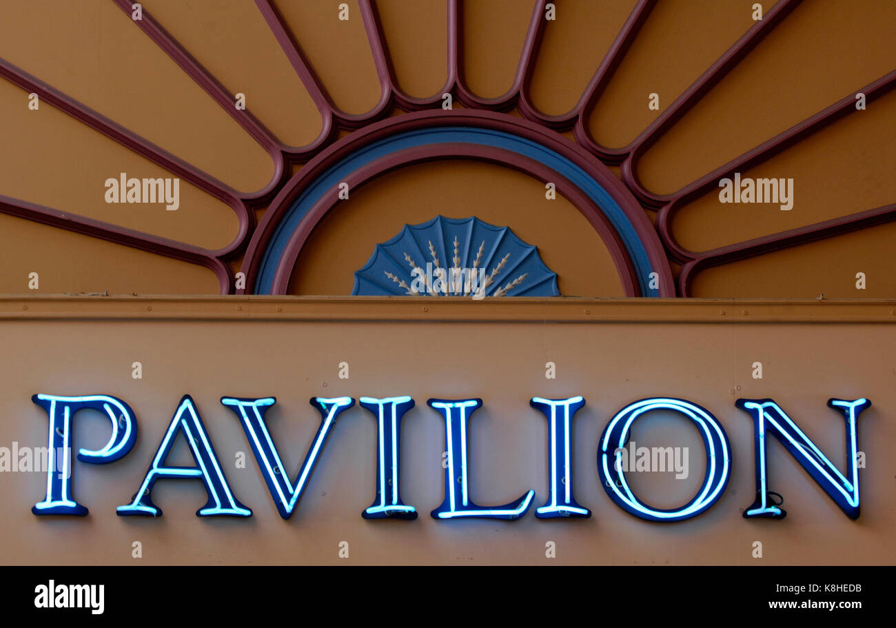 an illuminated or neon sign or lettering saying the word pavilion at ...