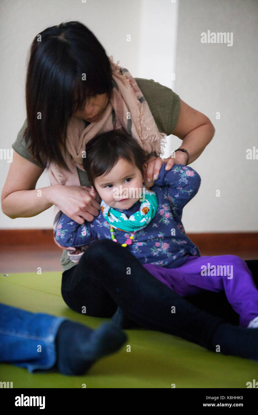 PARENT AND CHILD PRACTICING YOGA Stock Photo - Alamy