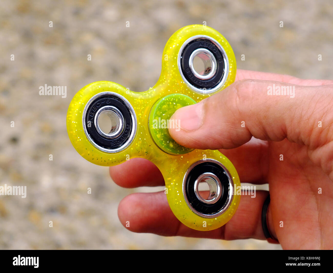 Fidget hand spinning game hi-res stock photography and images - Alamy