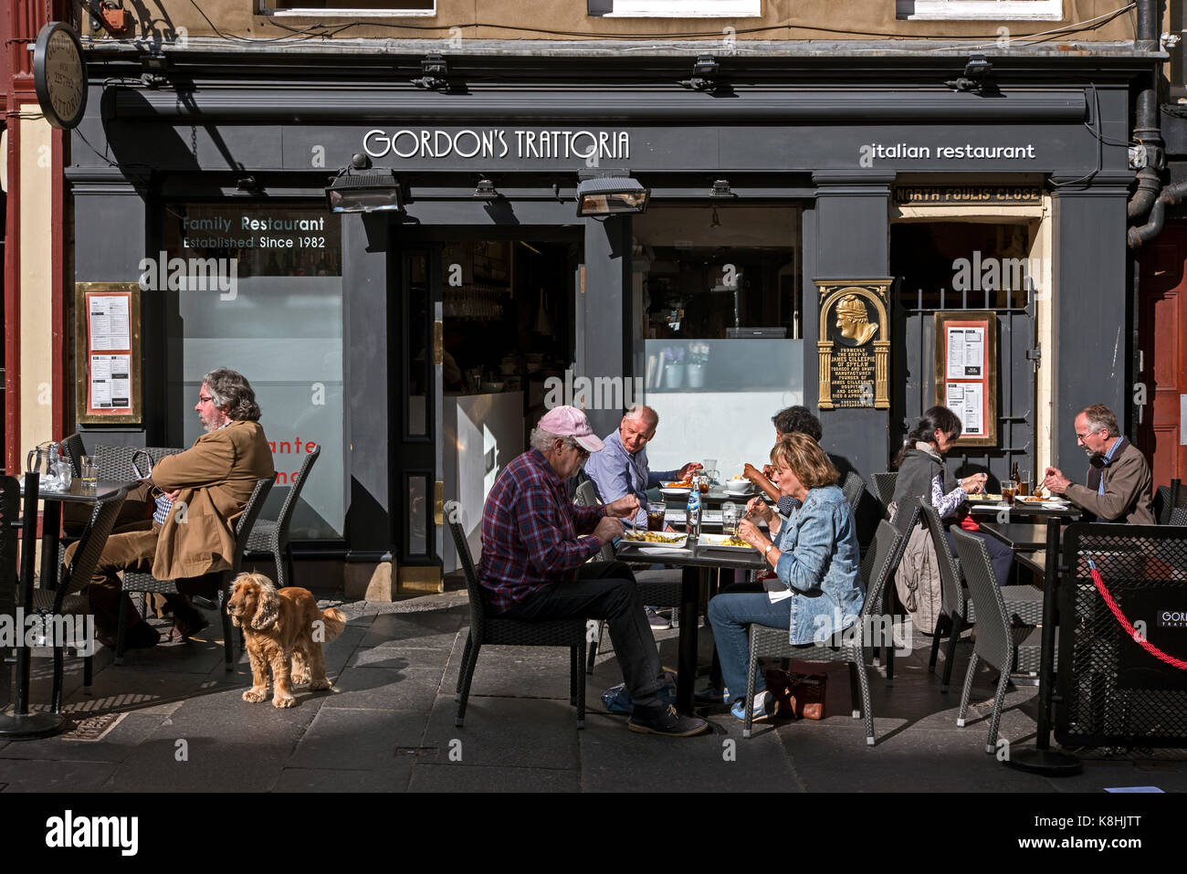 Diners eating in the Autumn sunshine outside Gordon's trattoria on the ...
