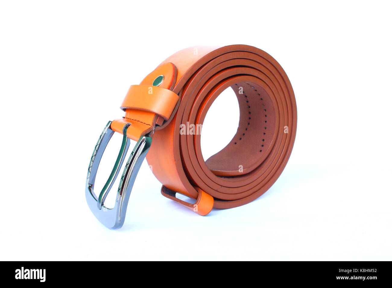 belt orange color on isolated white Stock Photo - Alamy