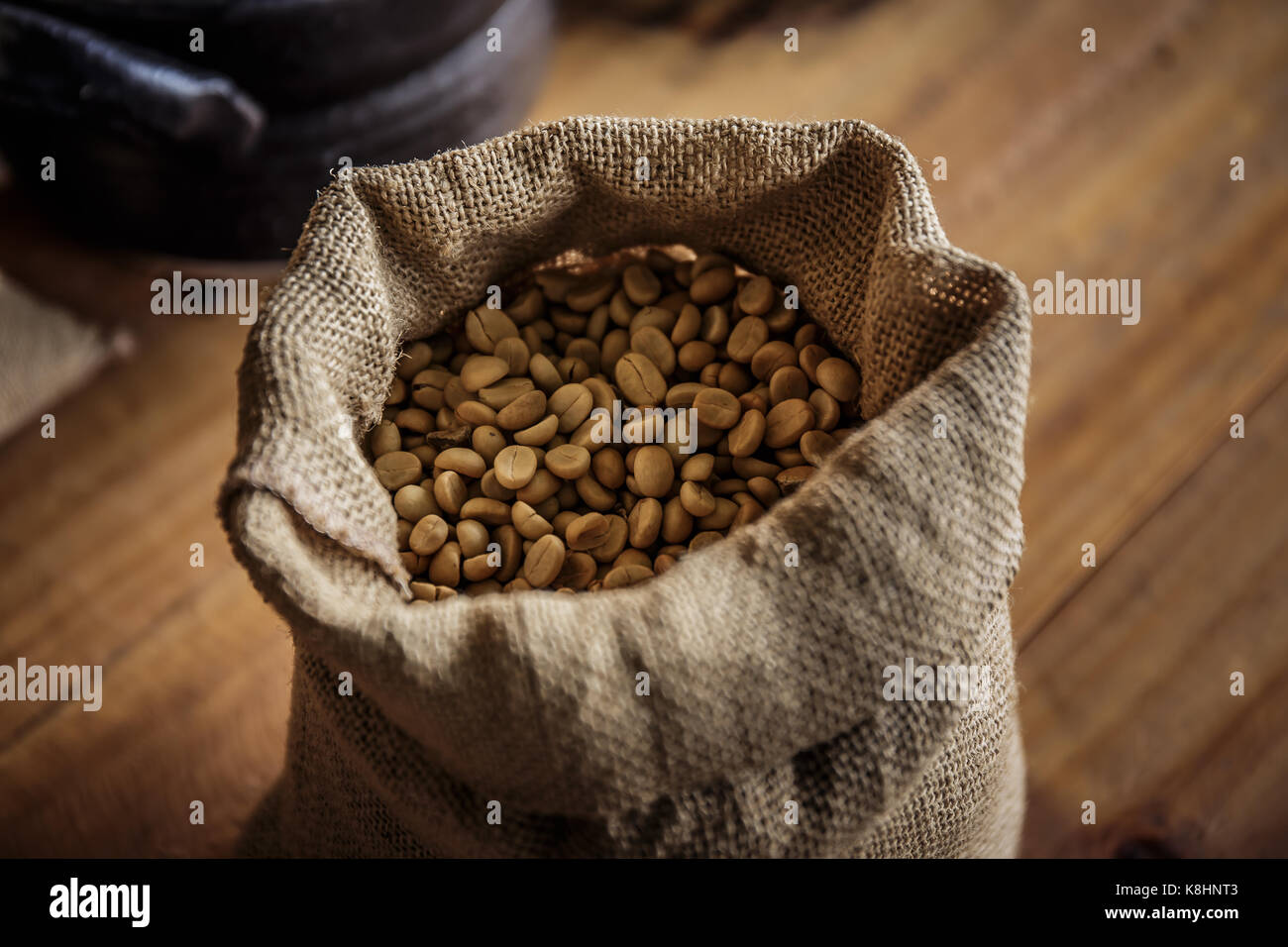 Fresh coffee beans in cloth bags Stock Photo - Alamy