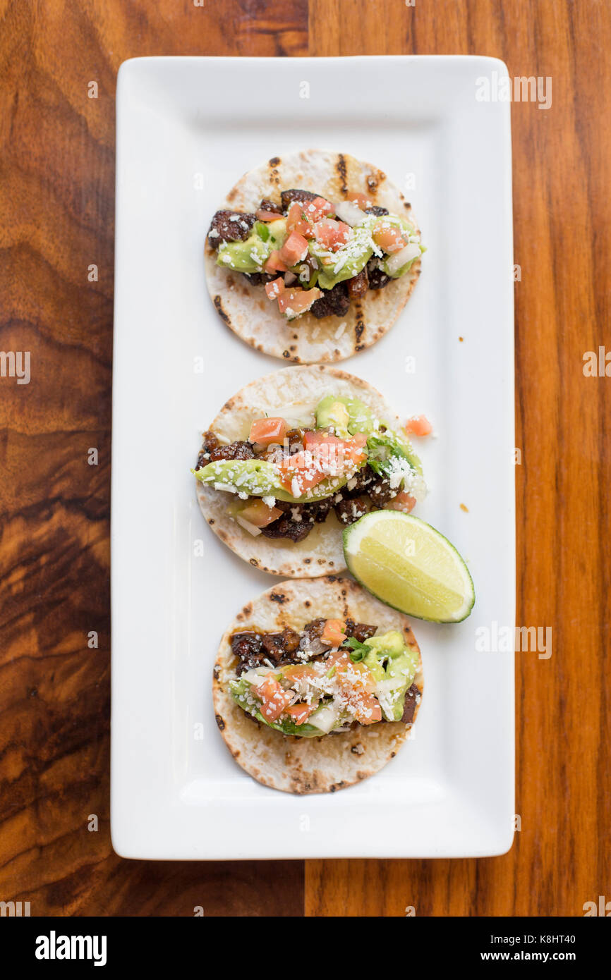 Overhead view of tostadas in plate at table Stock Photo - Alamy