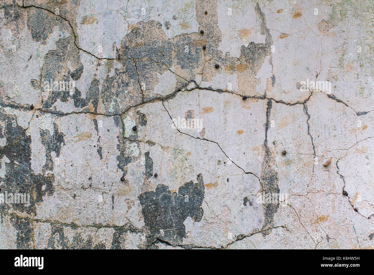 Texture of stone wall with peeling paint Stock Photo - Alamy