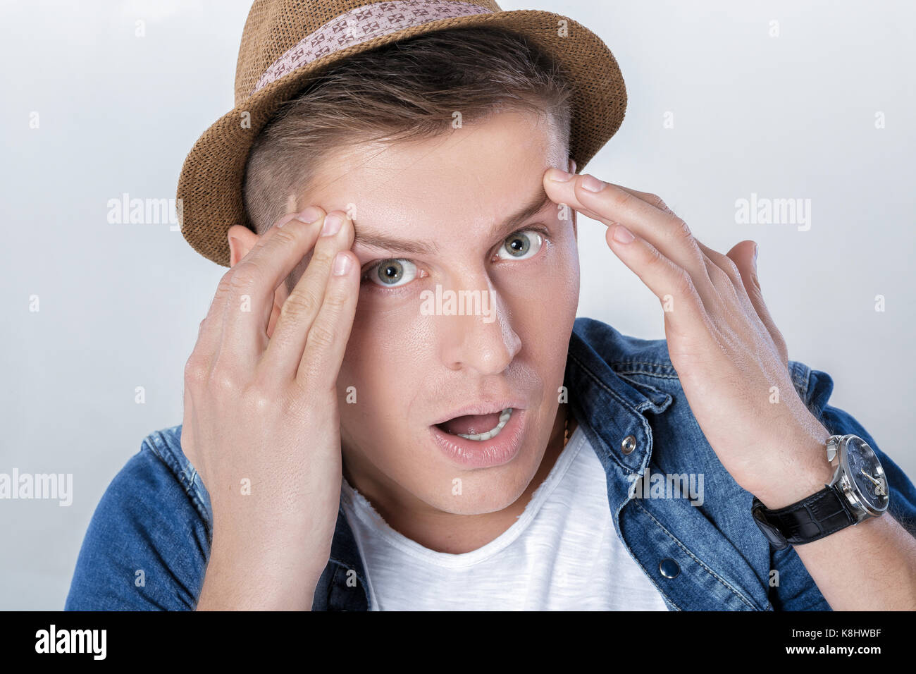 handsome man in denim with hat Stock Photo - Alamy