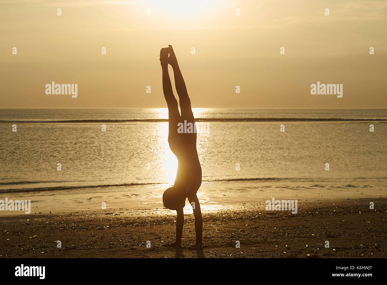 Girl doing handstand hi-res stock photography and images - Alamy