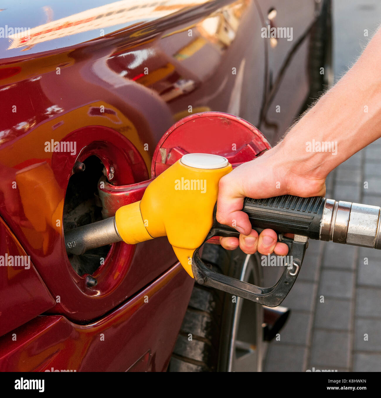 gas station fuel red car Stock Photo - Alamy