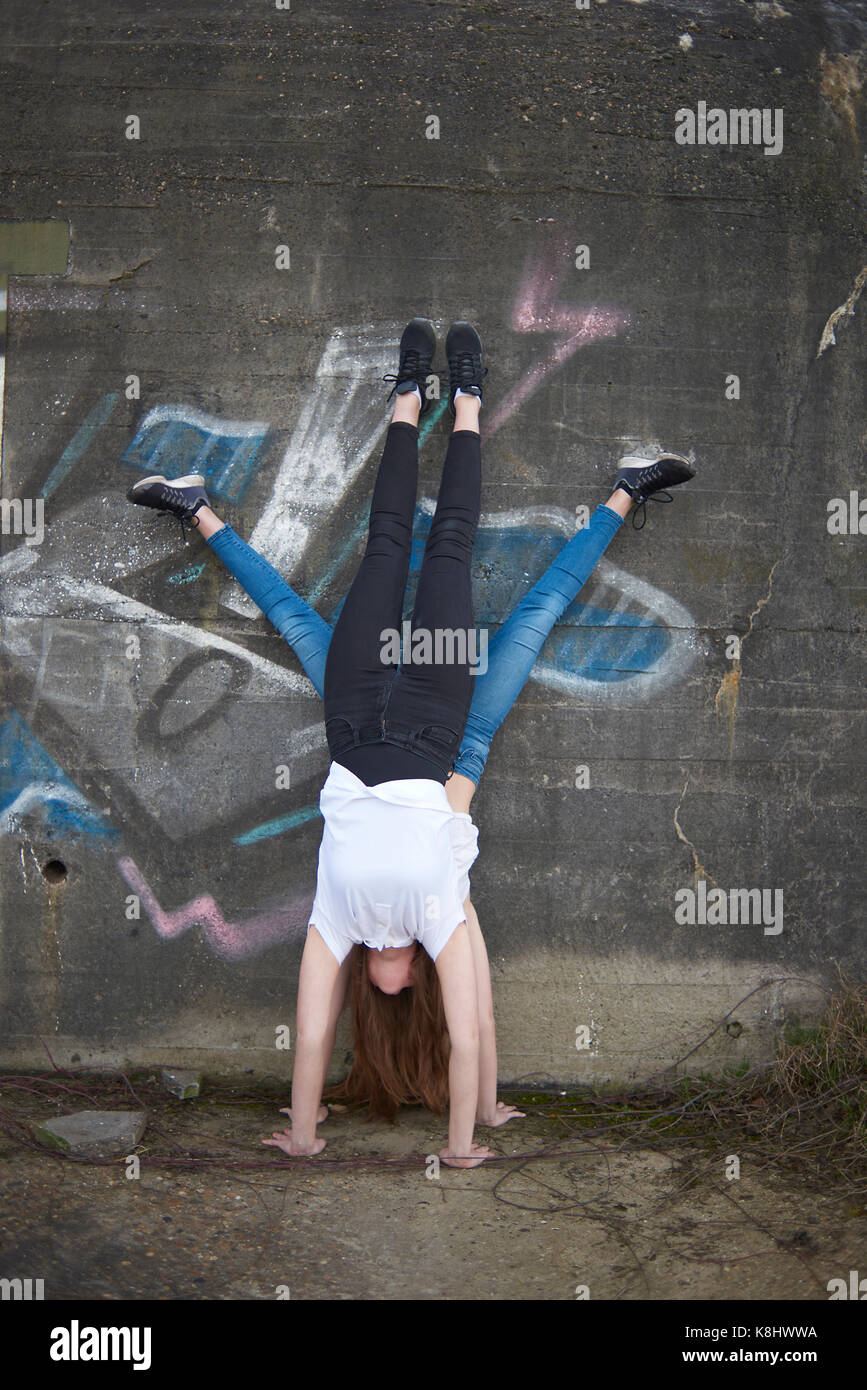 Handstand against wall hi-res stock photography and images - Alamy