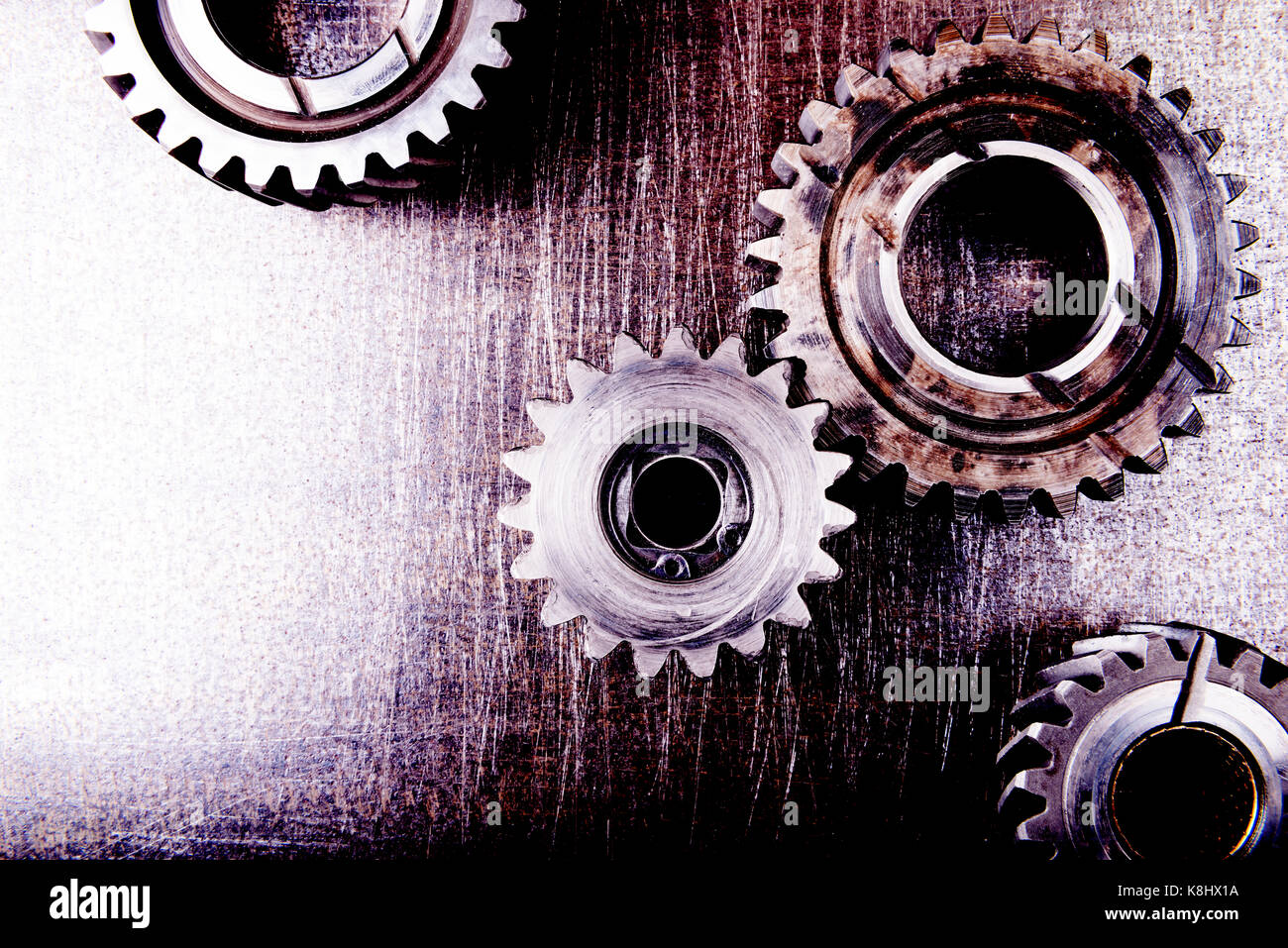 Gears on a metal background Stock Photo - Alamy