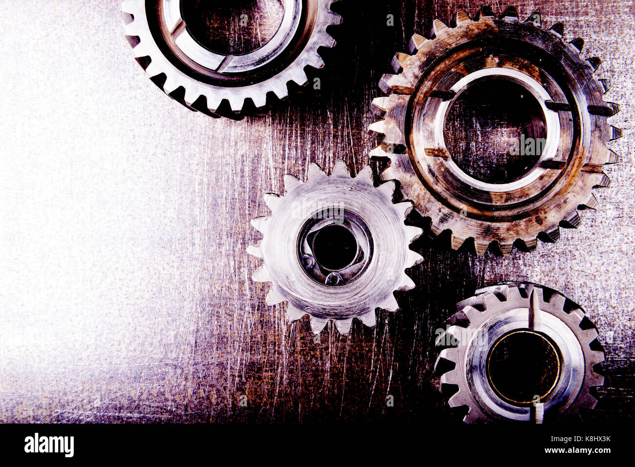 Gears on a metal background Stock Photo - Alamy
