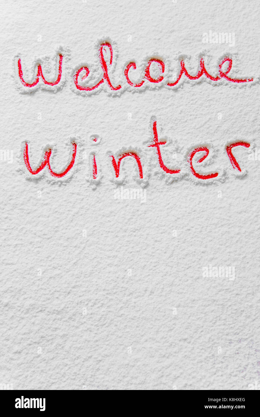 Written "Welcome winter" on the snow Stock Photo - Alamy