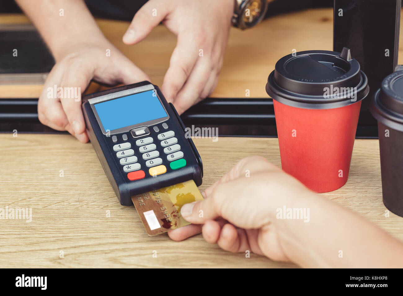 Young woman in cafe calculator hi-res stock photography and images - Alamy