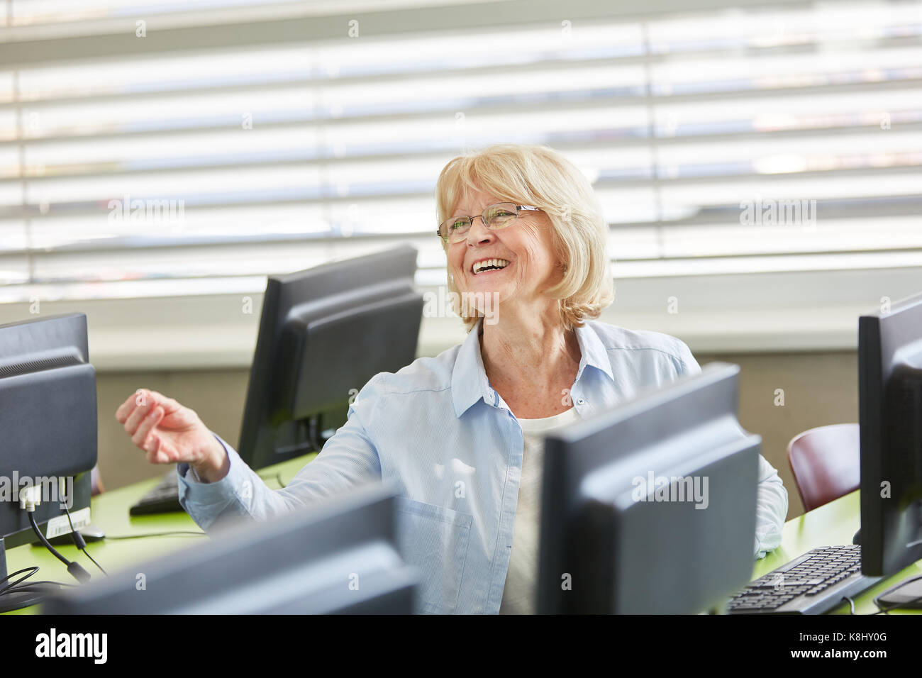 Happy senior citizen learning in computer course training Stock Photo ...