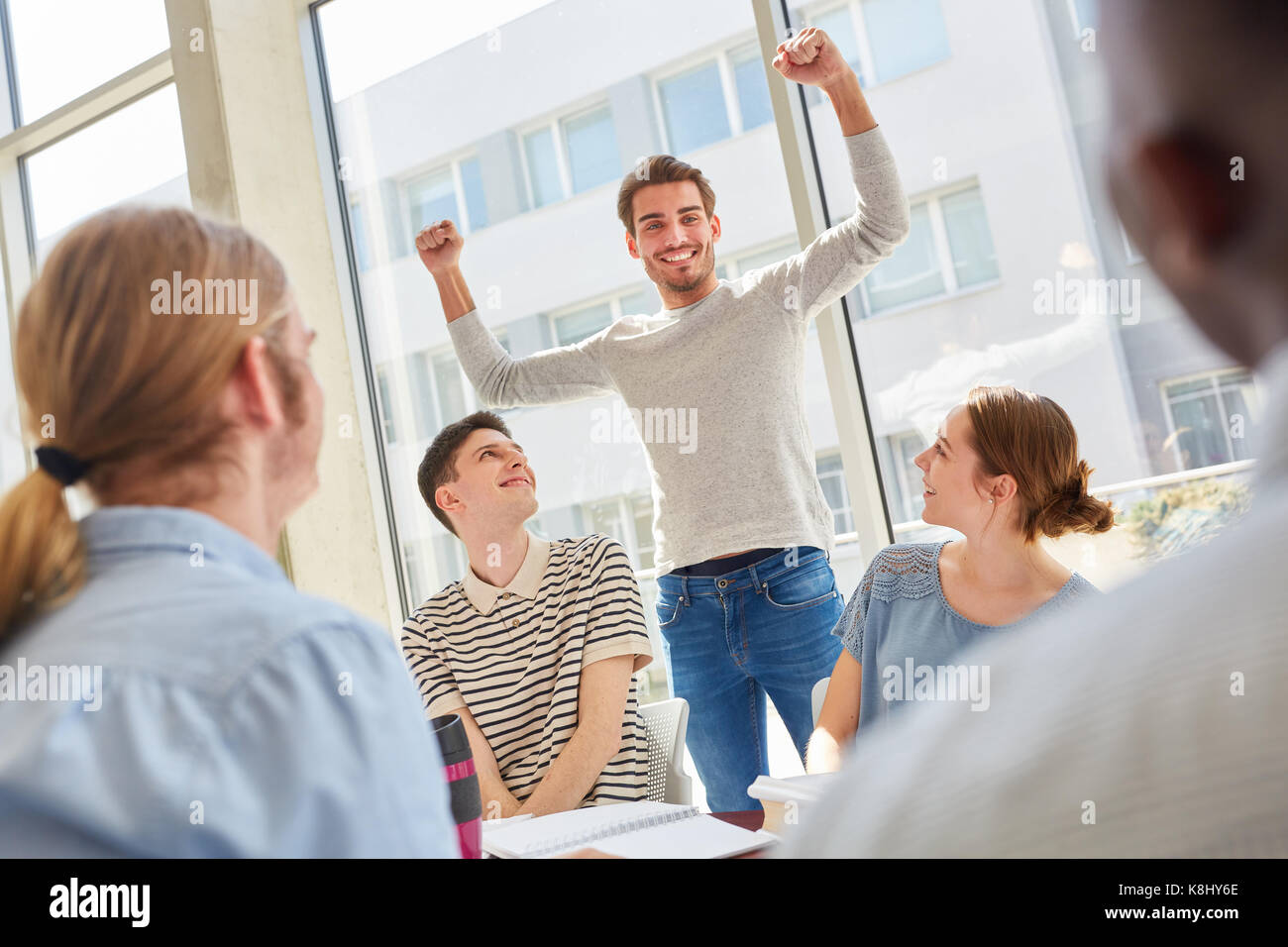 Happy students celebration of successful exam results in university ...