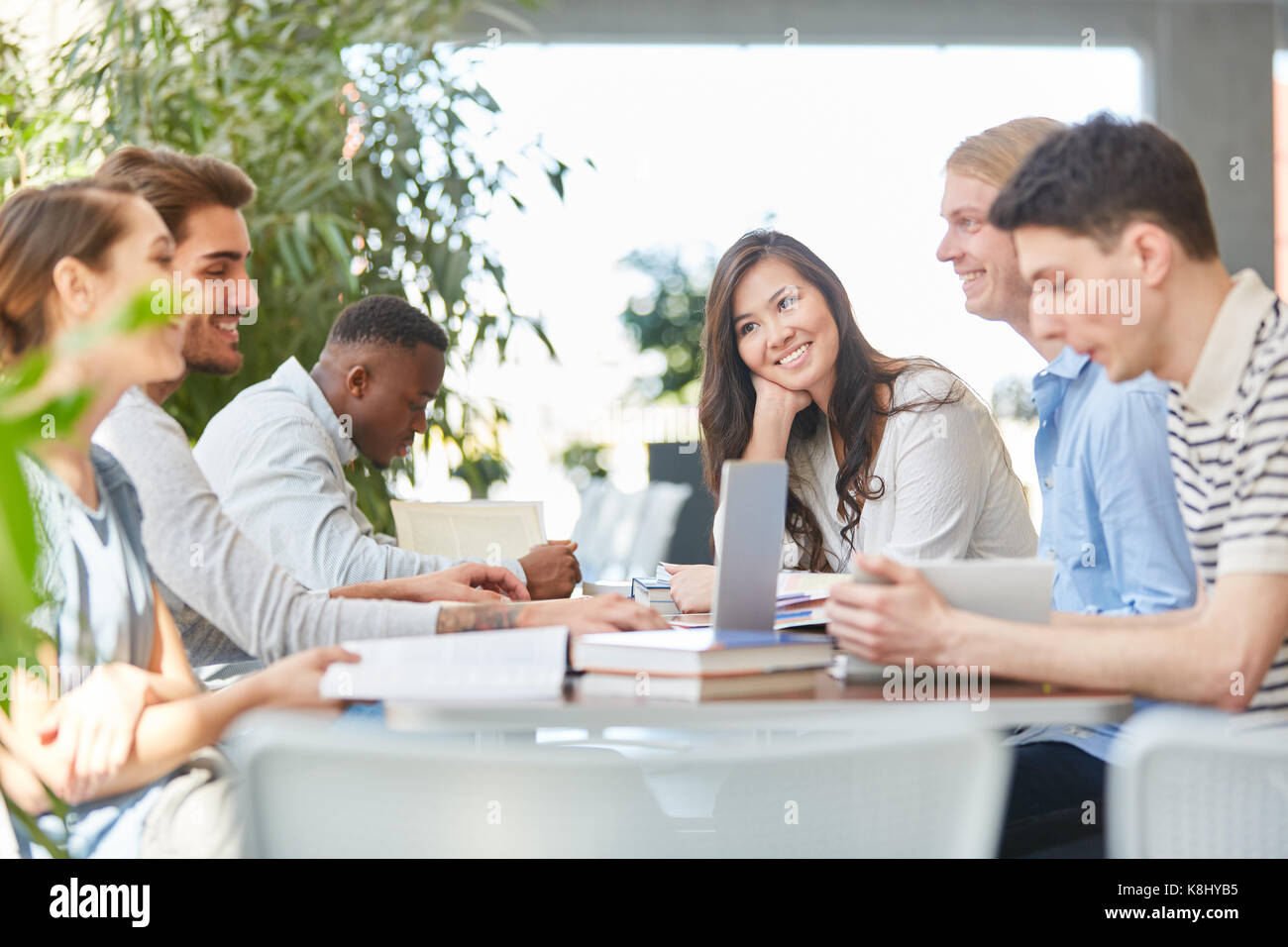Interracial team of students work group session in school Stock Photo ...