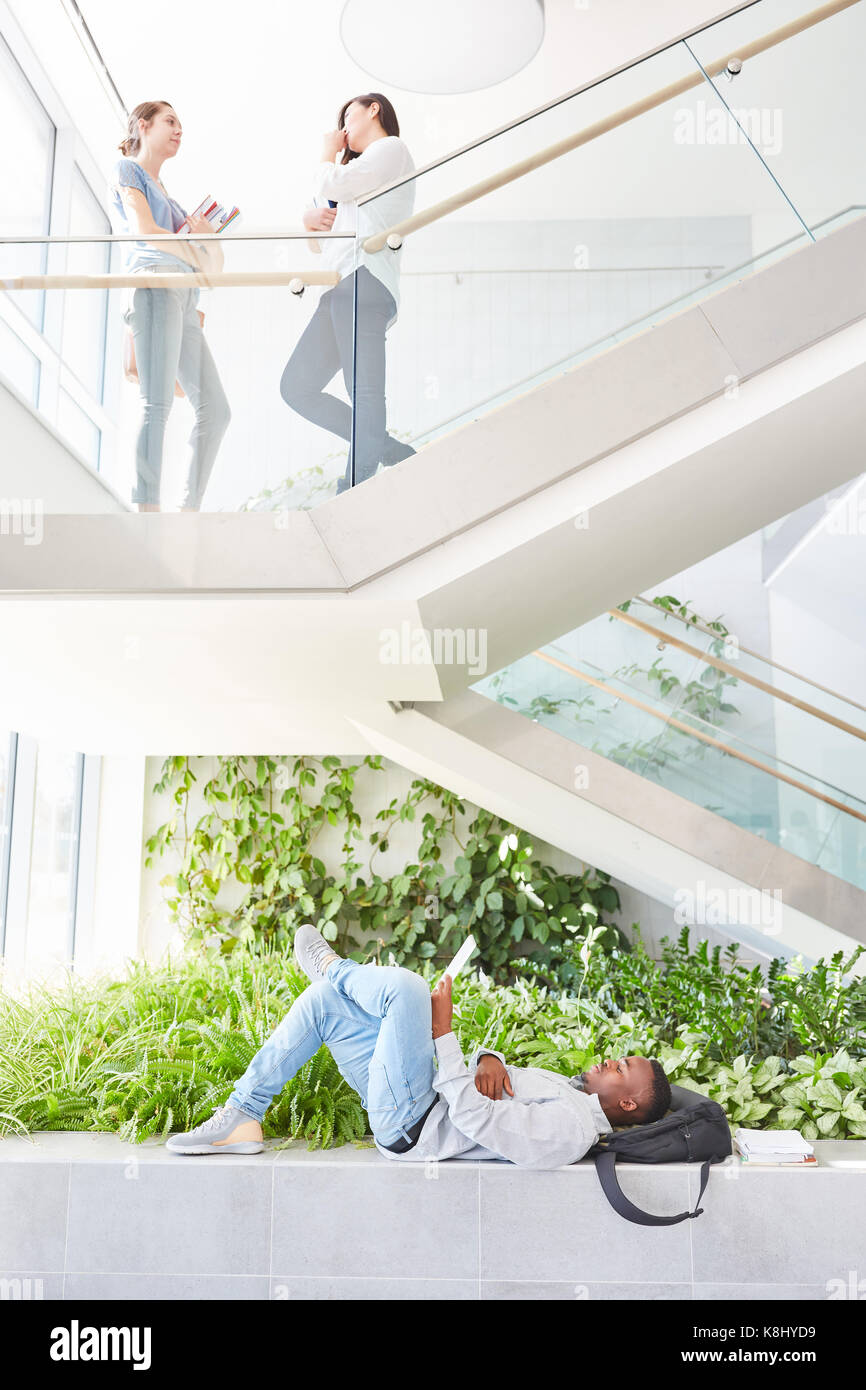 Students in class break in college or university Stock Photo - Alamy