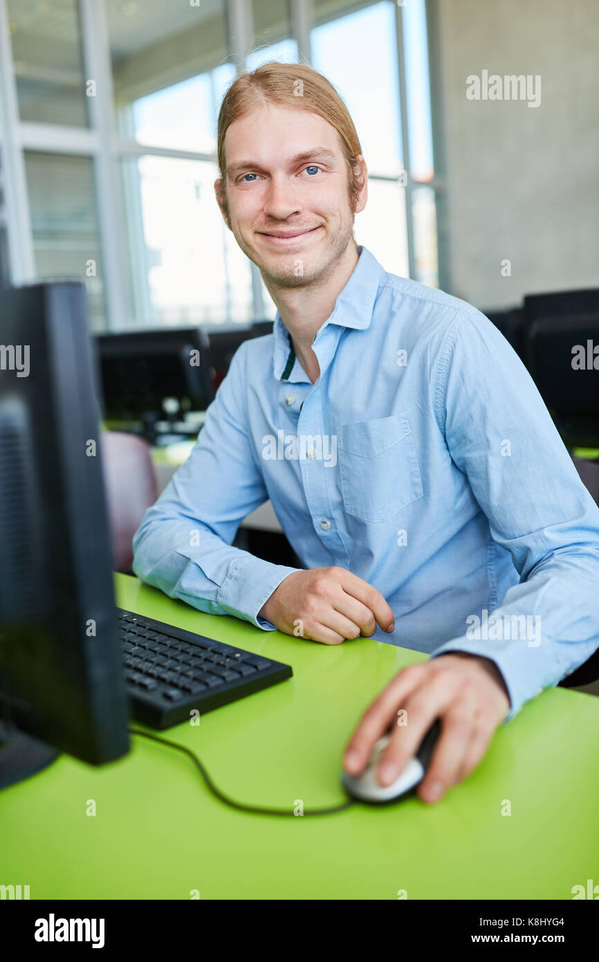 Nerd with computer hi-res stock photography and images - Alamy