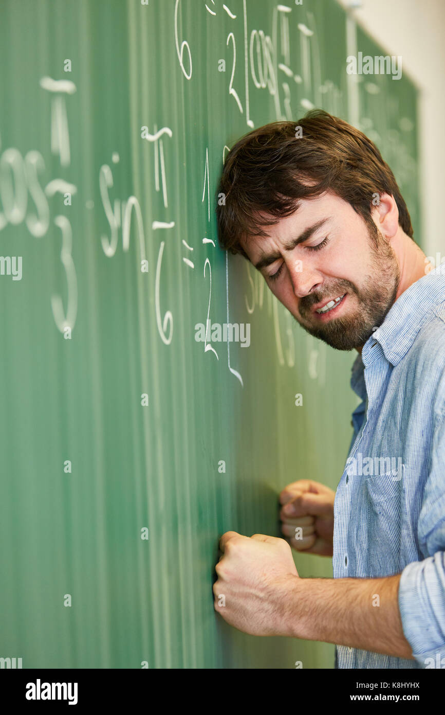 Man as young student with frustration after test Stock Photo - Alamy
