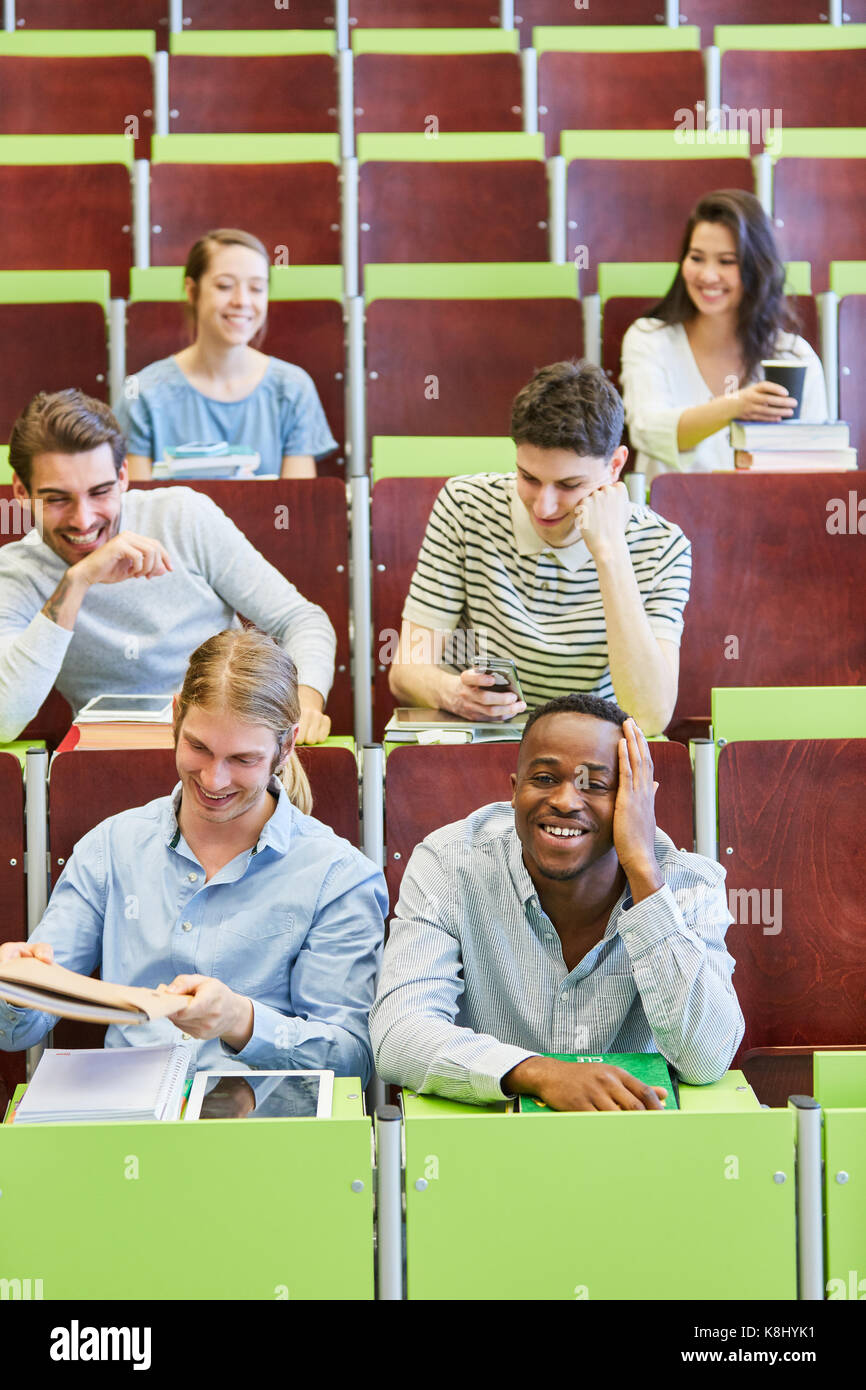 Happy group of students having fun in university lecture Stock Photo ...