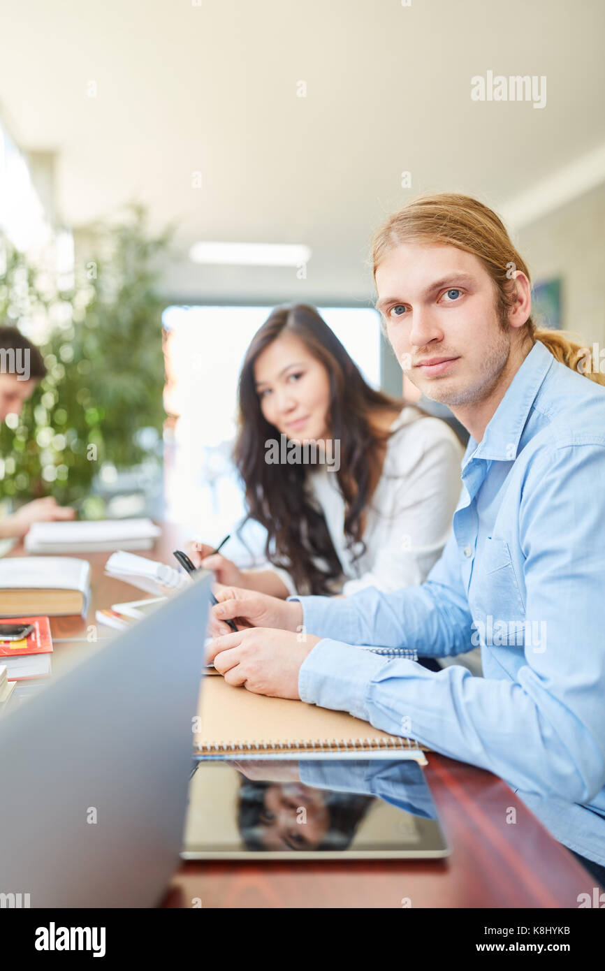Students study together in workshop in college Stock Photo - Alamy