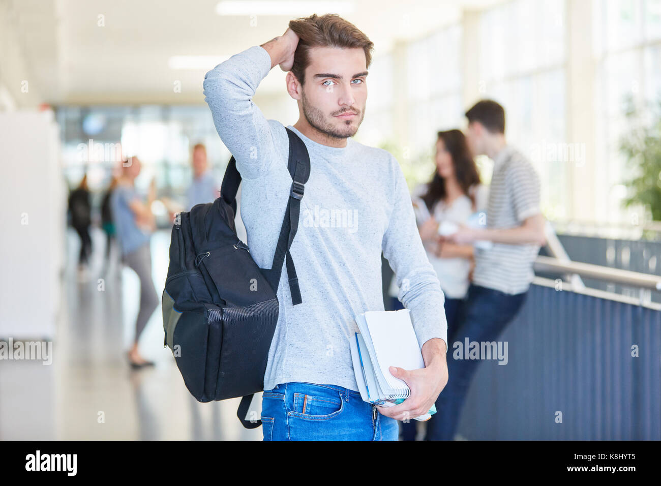 Stressed cool student in university as freshman Stock Photo - Alamy