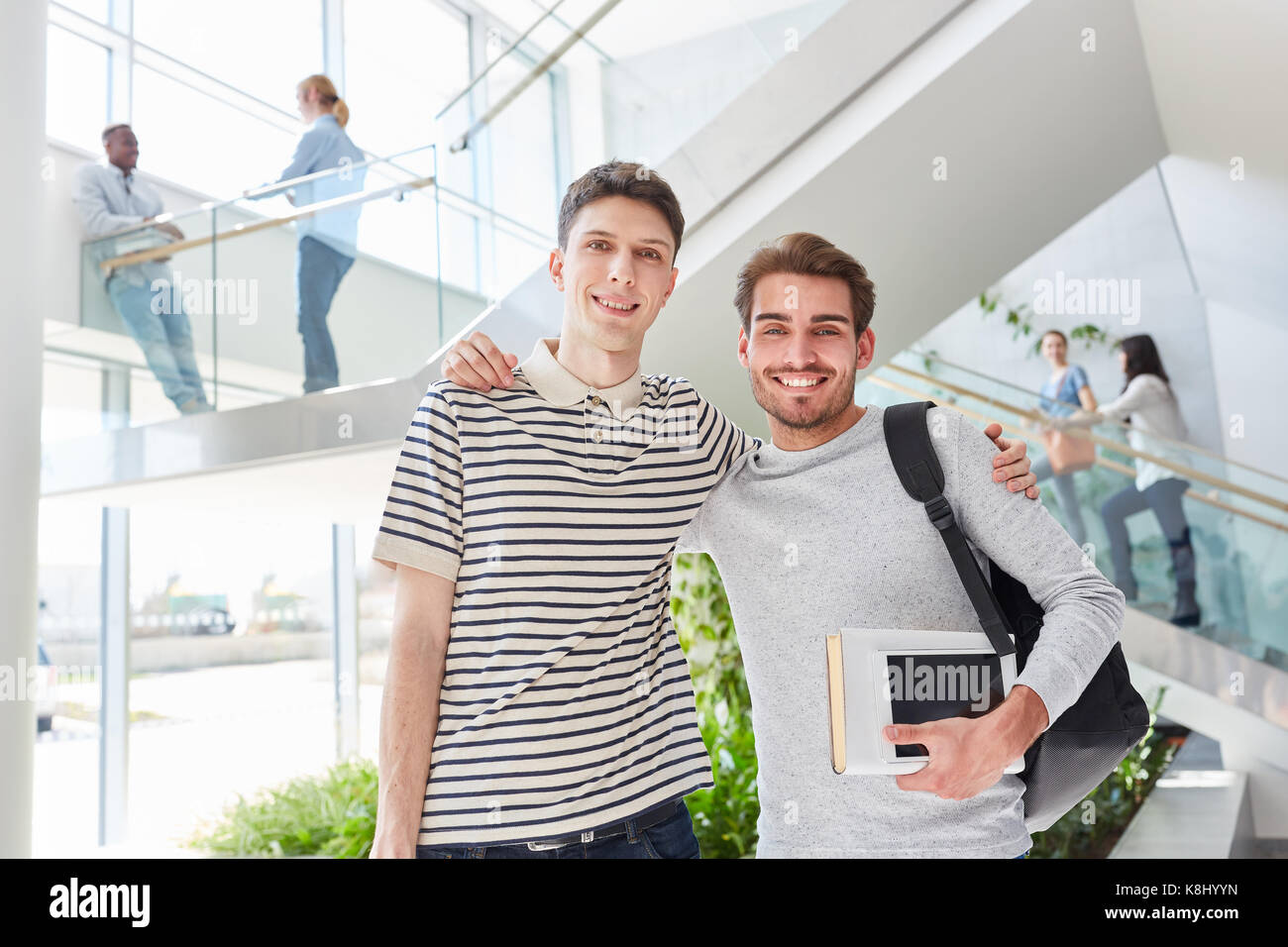 Two friends embrace in hi-res stock photography and images - Alamy