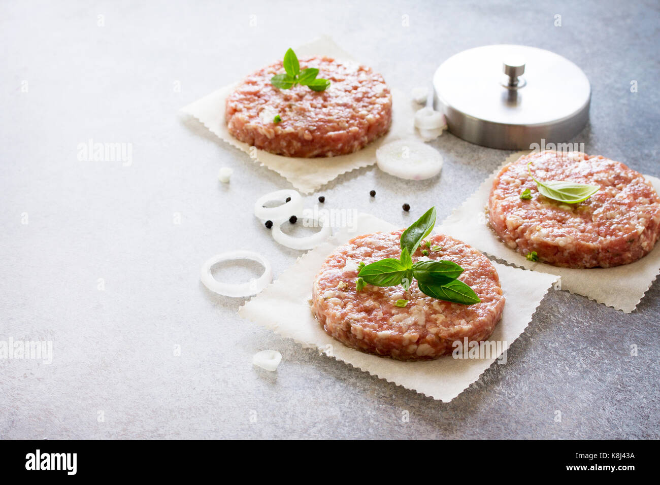 Raw hamburgers cutlets from hi-res stock photography and images - Alamy