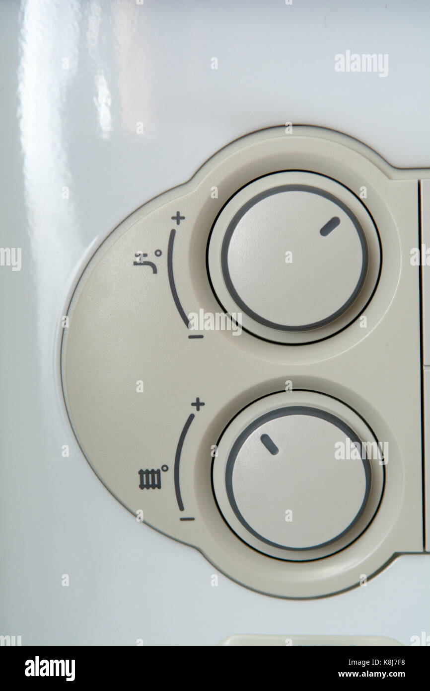Temperature control dial for central heating at home Stock Photo - Alamy