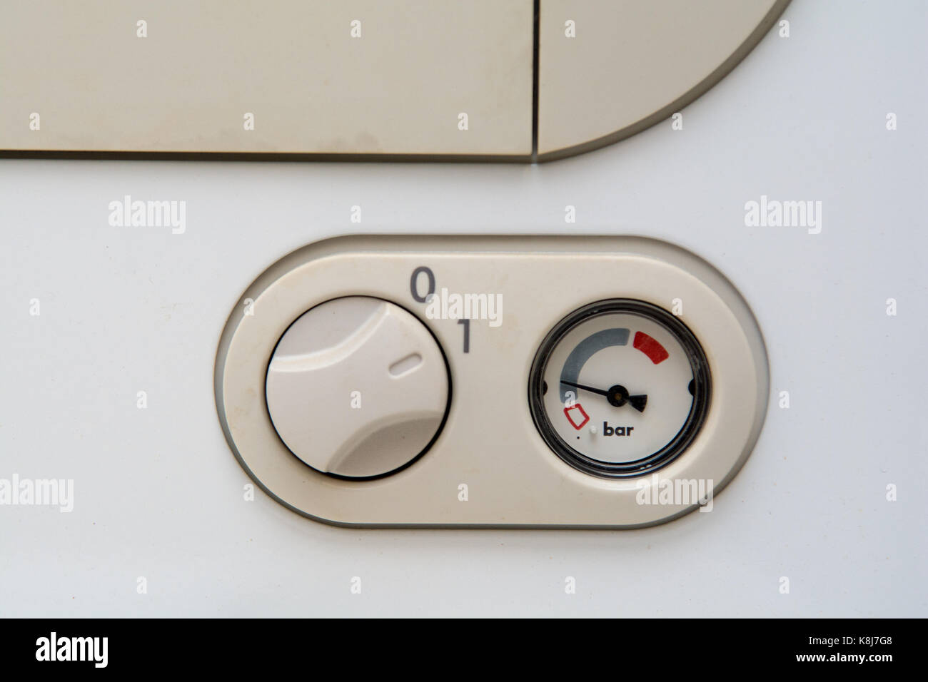 Temperature control dial for central heating at home Stock Photo - Alamy