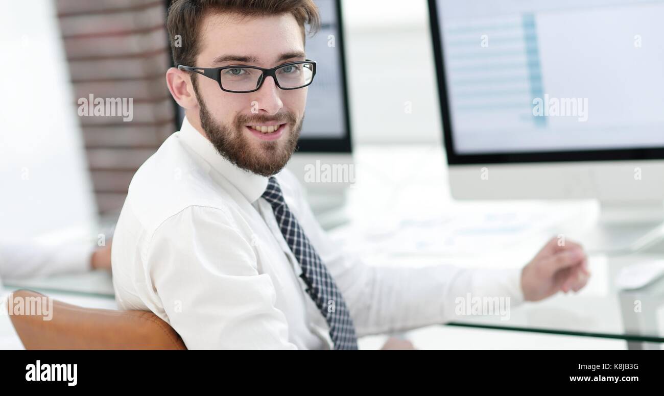 experienced programmer sitting in front of the monitor Stock Photo - Alamy
