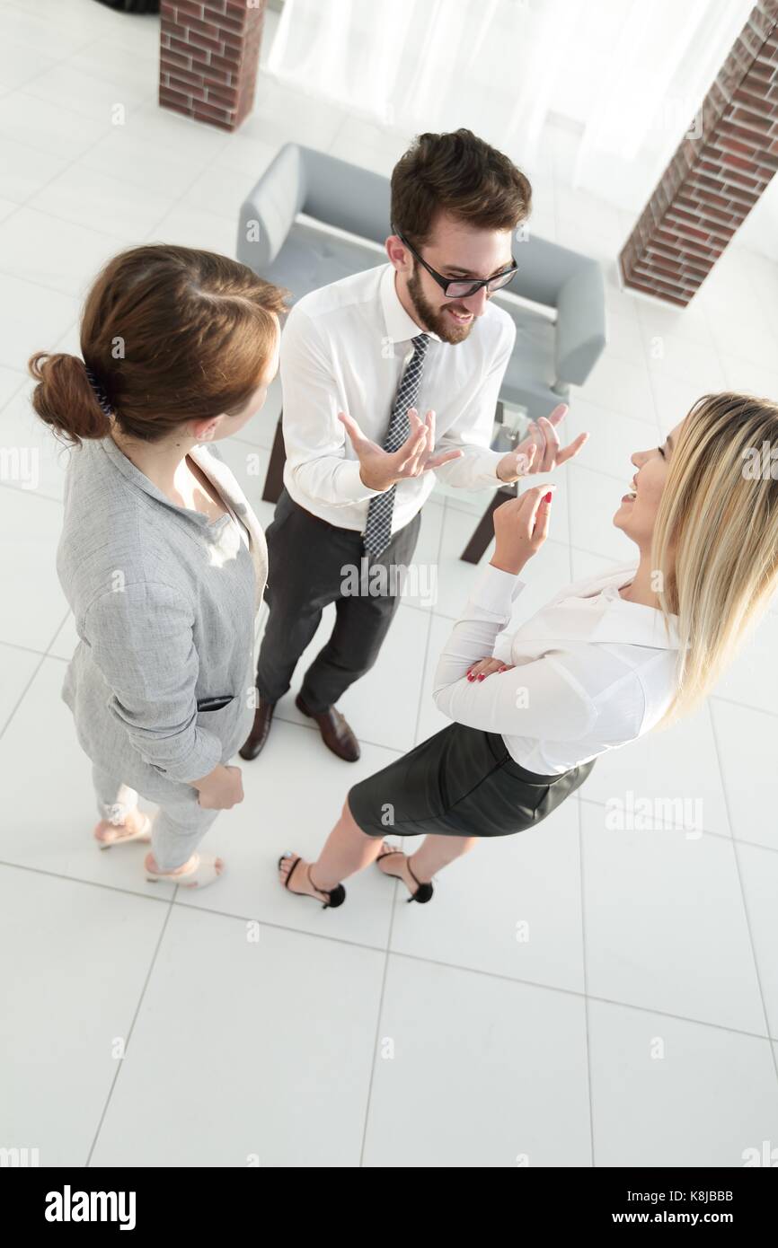 business team discussing in office Stock Photo - Alamy
