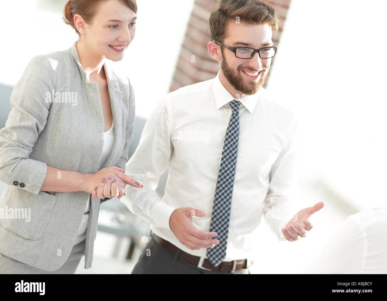 Manager and business team talking in the office Stock Photo - Alamy
