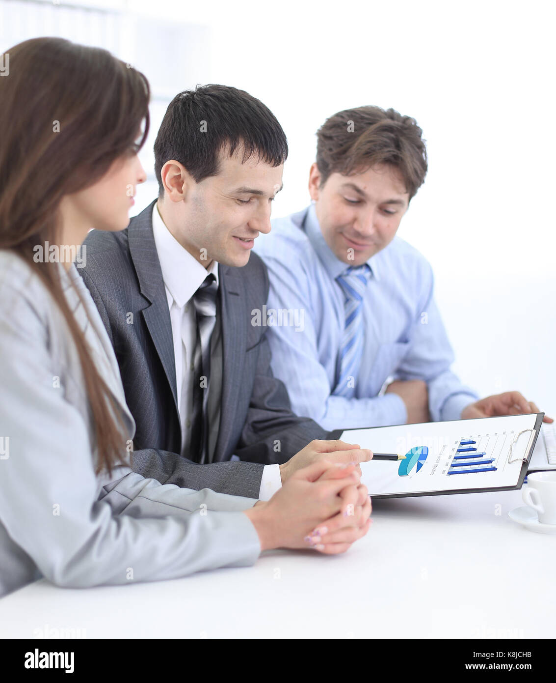 business team discussing a financial plan Stock Photo - Alamy