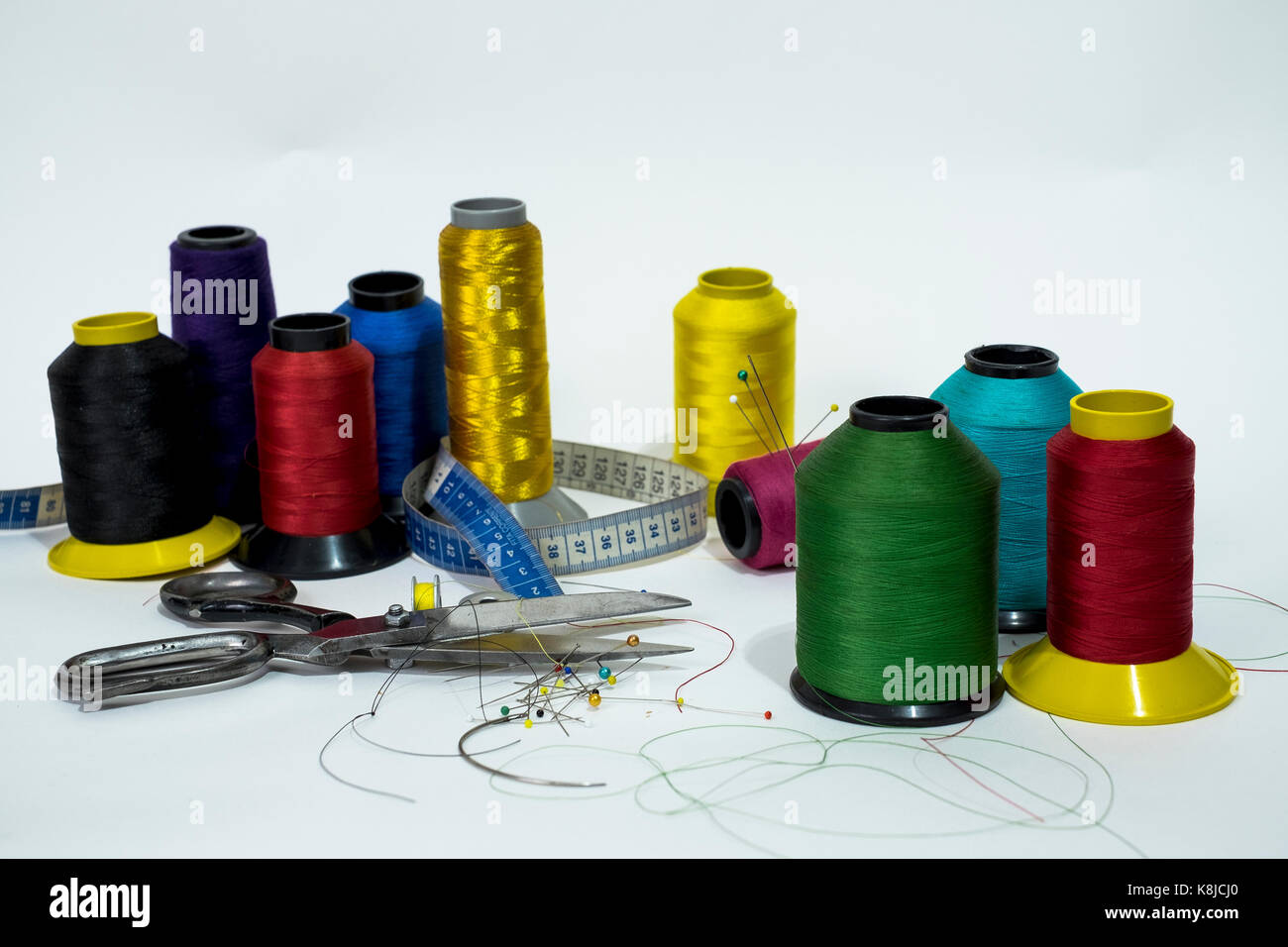 line reels, scissors, metric tape, pin and needles, some of the many ...