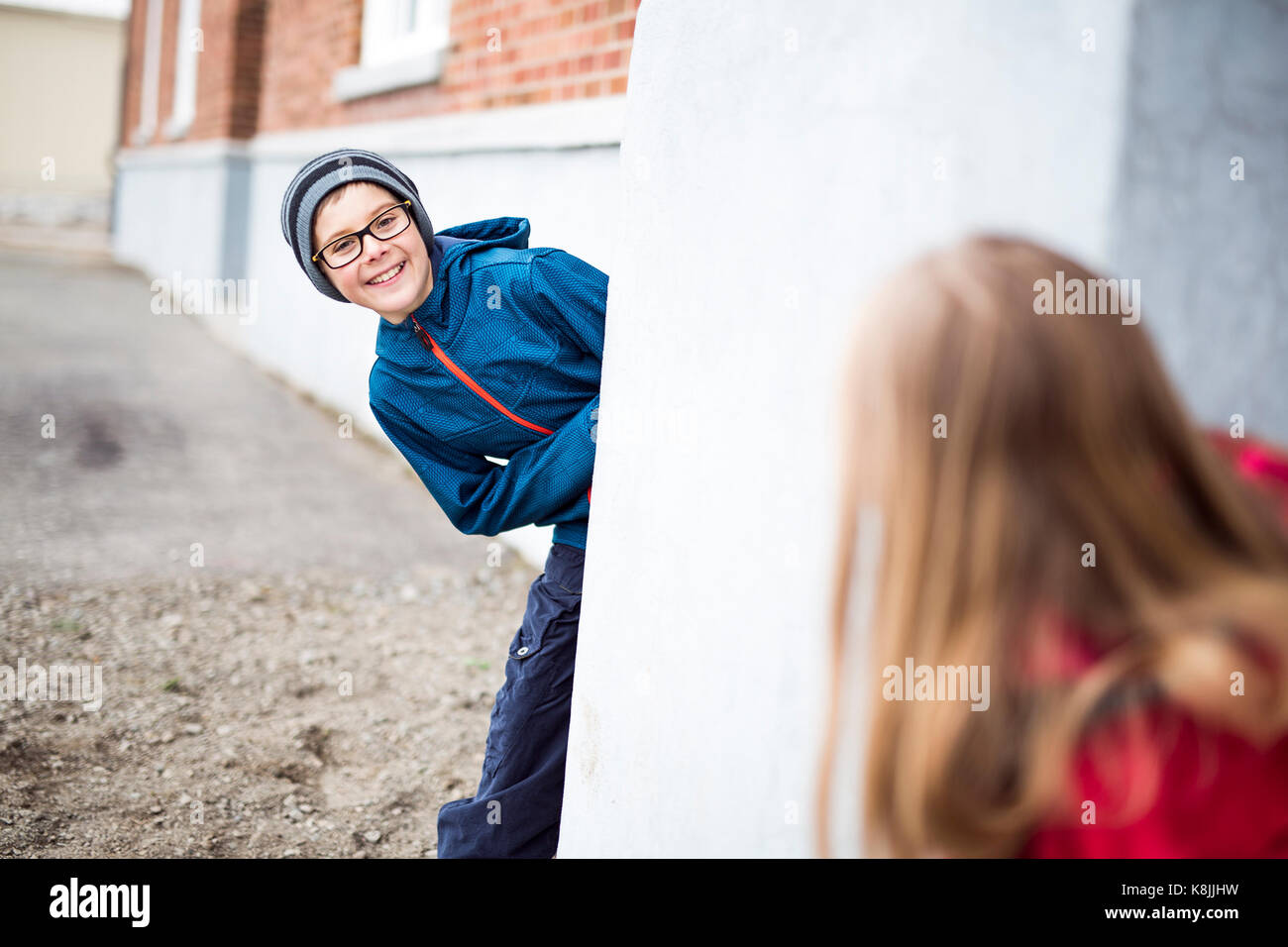 Children outside school building backpack hi-res stock photography and ...