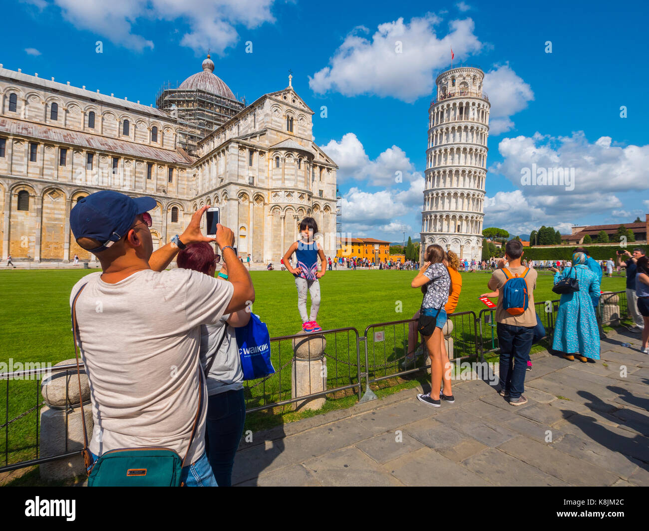 Tourists in Pisa at the most popular place for photos - The Leaning ...