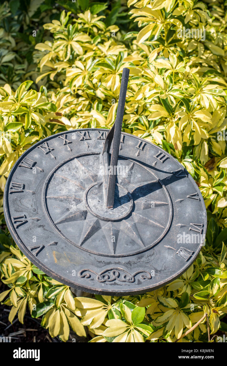 sundial in the garden Stock Photo - Alamy