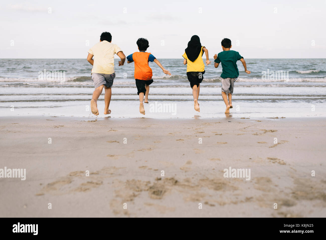 Kids Running On The Beach