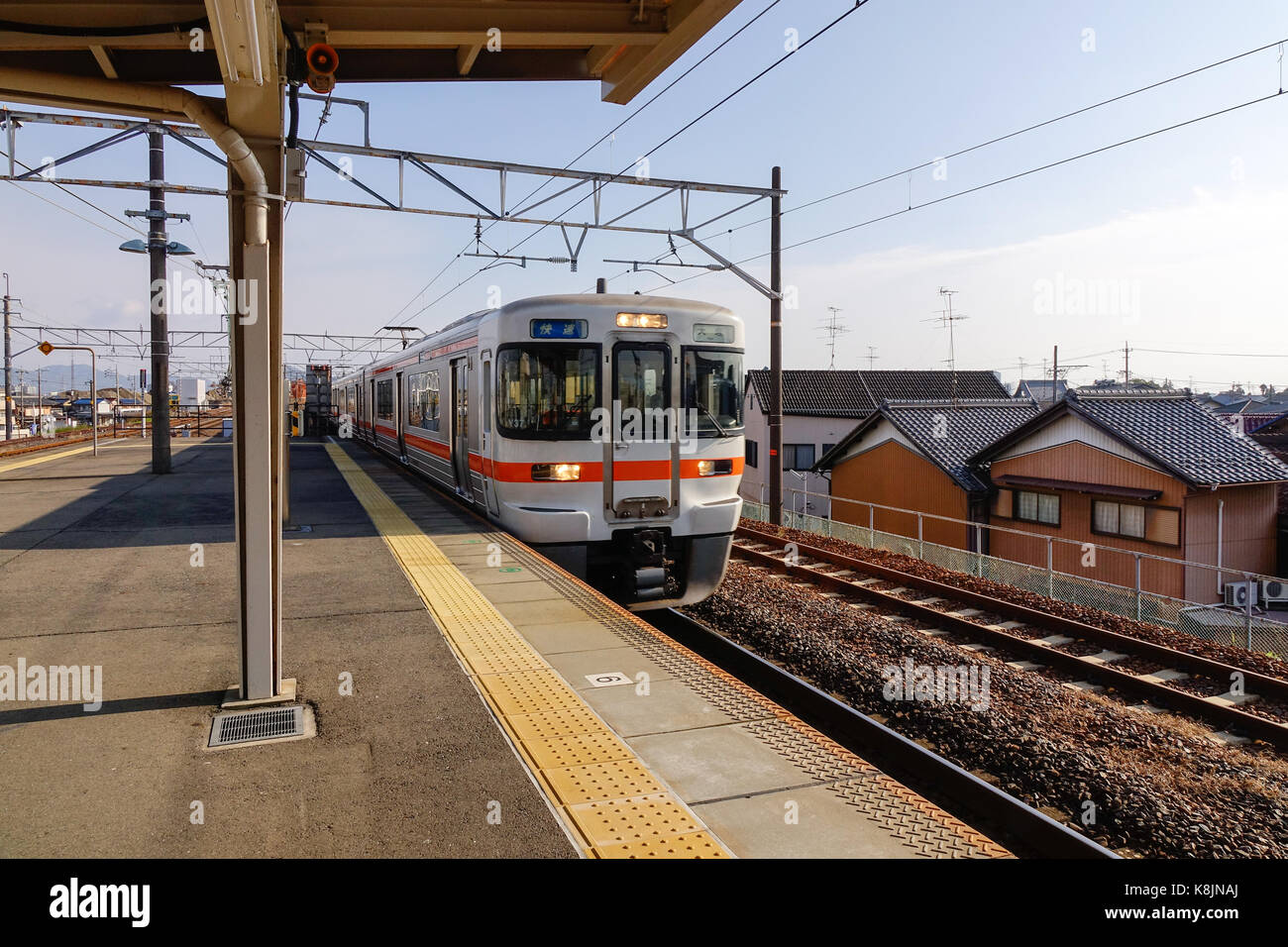 Tokyo, Japan - Dec 25, 2015. A JR train coming to the railway station ...