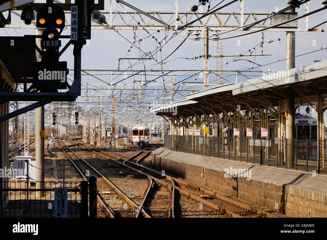 Tokyo, Japan - Dec 25, 2015. A JR train running on track and coming to ...