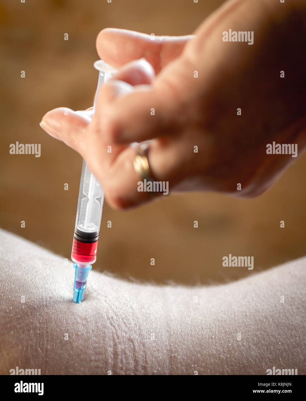 The procedure for injecting drugs at home close-up Stock Photo - Alamy